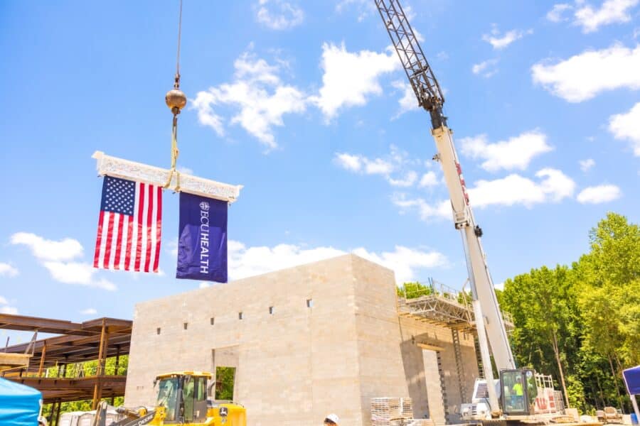 Signed beam raised into place at upcoming behavioral health hospital ...